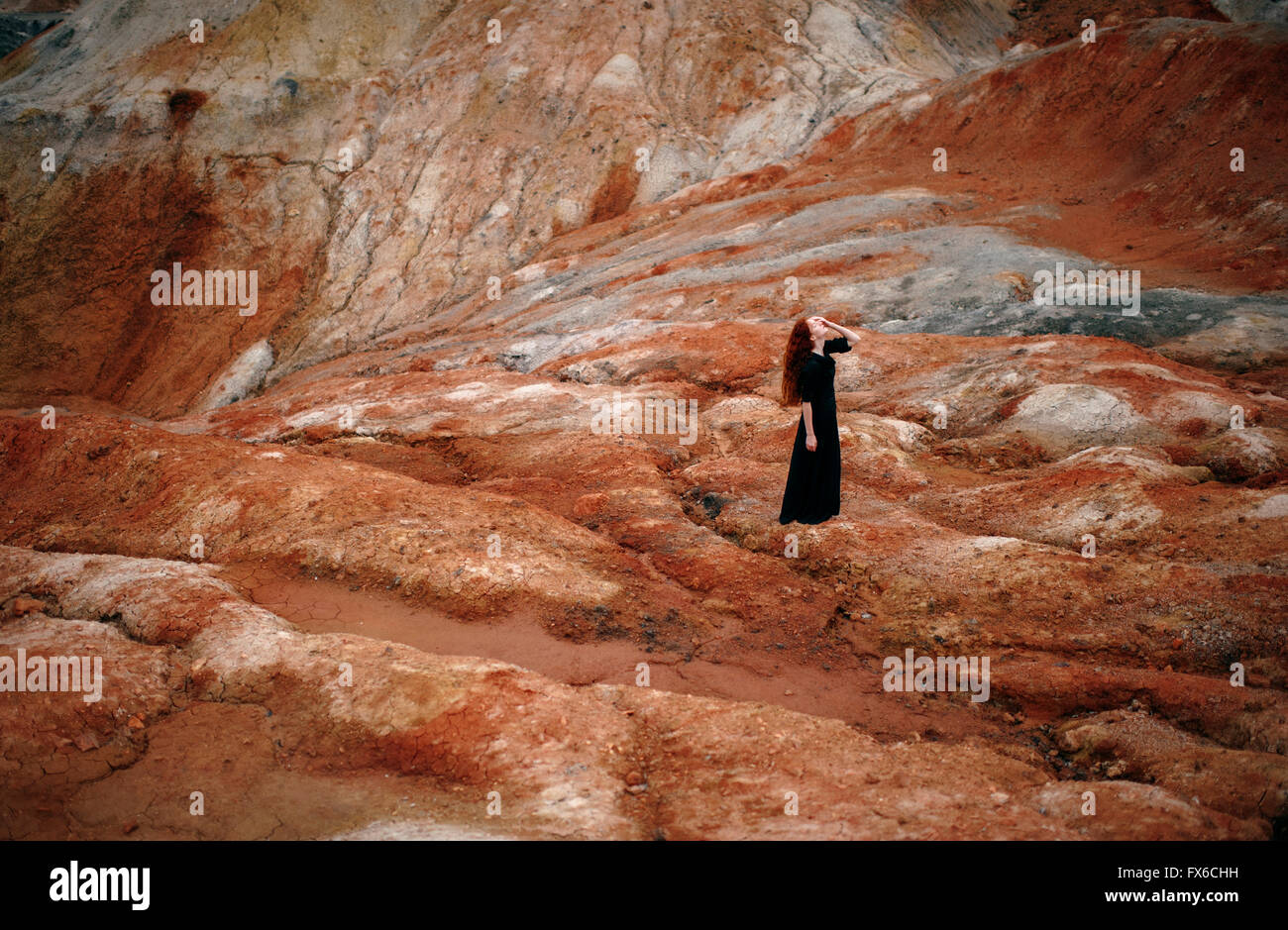 Caucasian woman walking on rock formation Stock Photo - Alamy