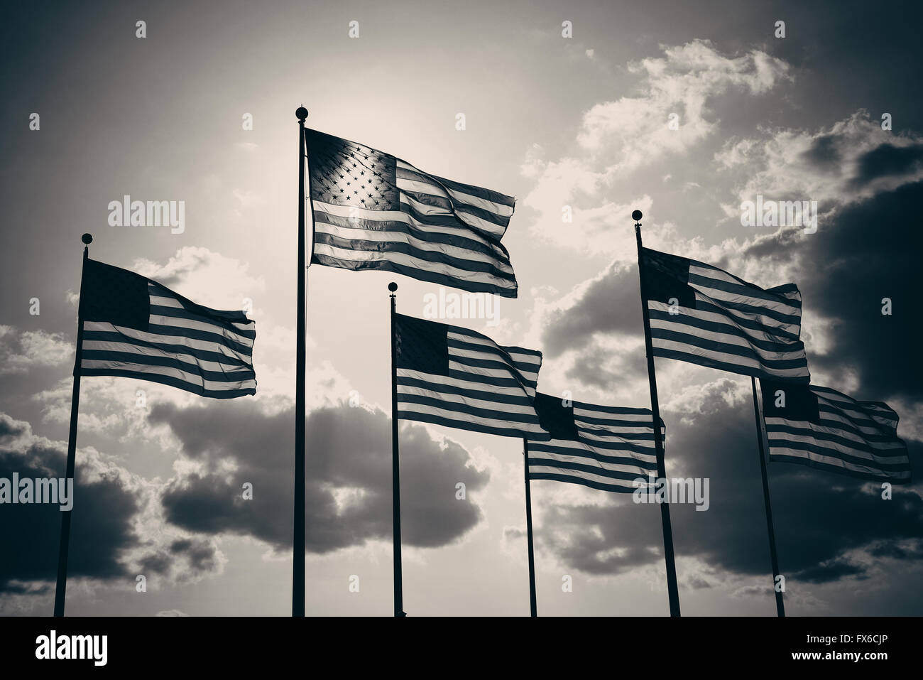 United States National Flag flying in sky Stock Photo - Alamy