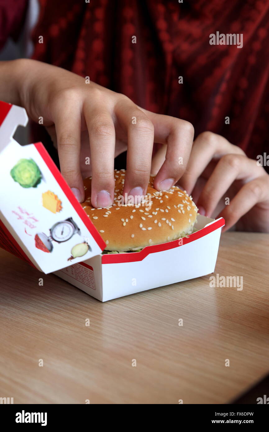 Eating mcdonalds big mac hi-res stock photography and images - Alamy