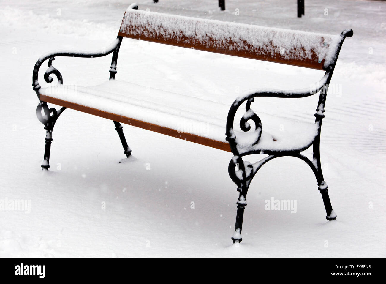 Snow-covered bench, Park bench snow seat Winter white Stock Photo - Alamy