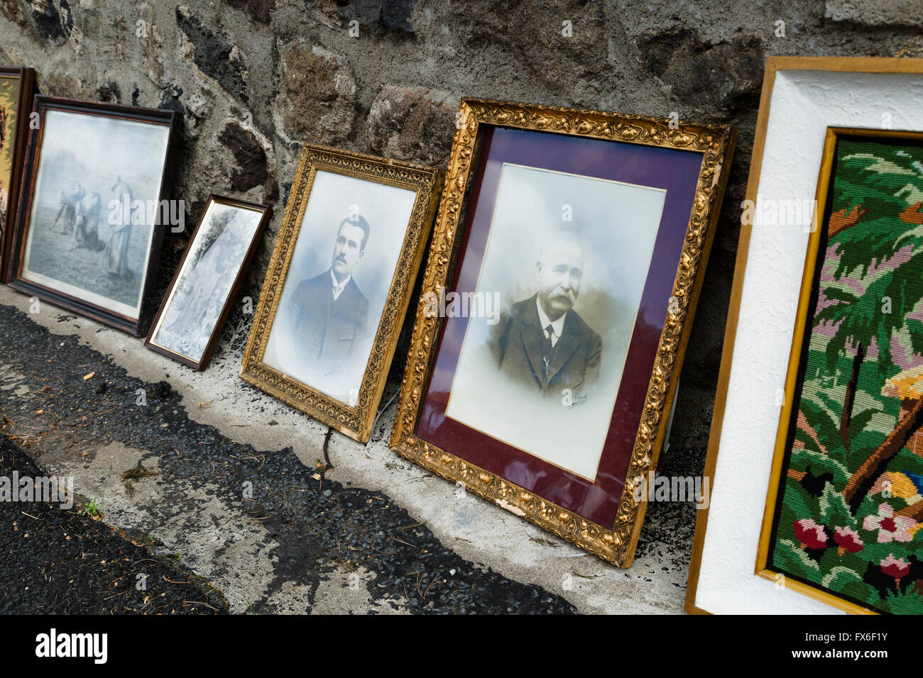 Vintage photographic portraits for sale at a vide-grenier in the ...