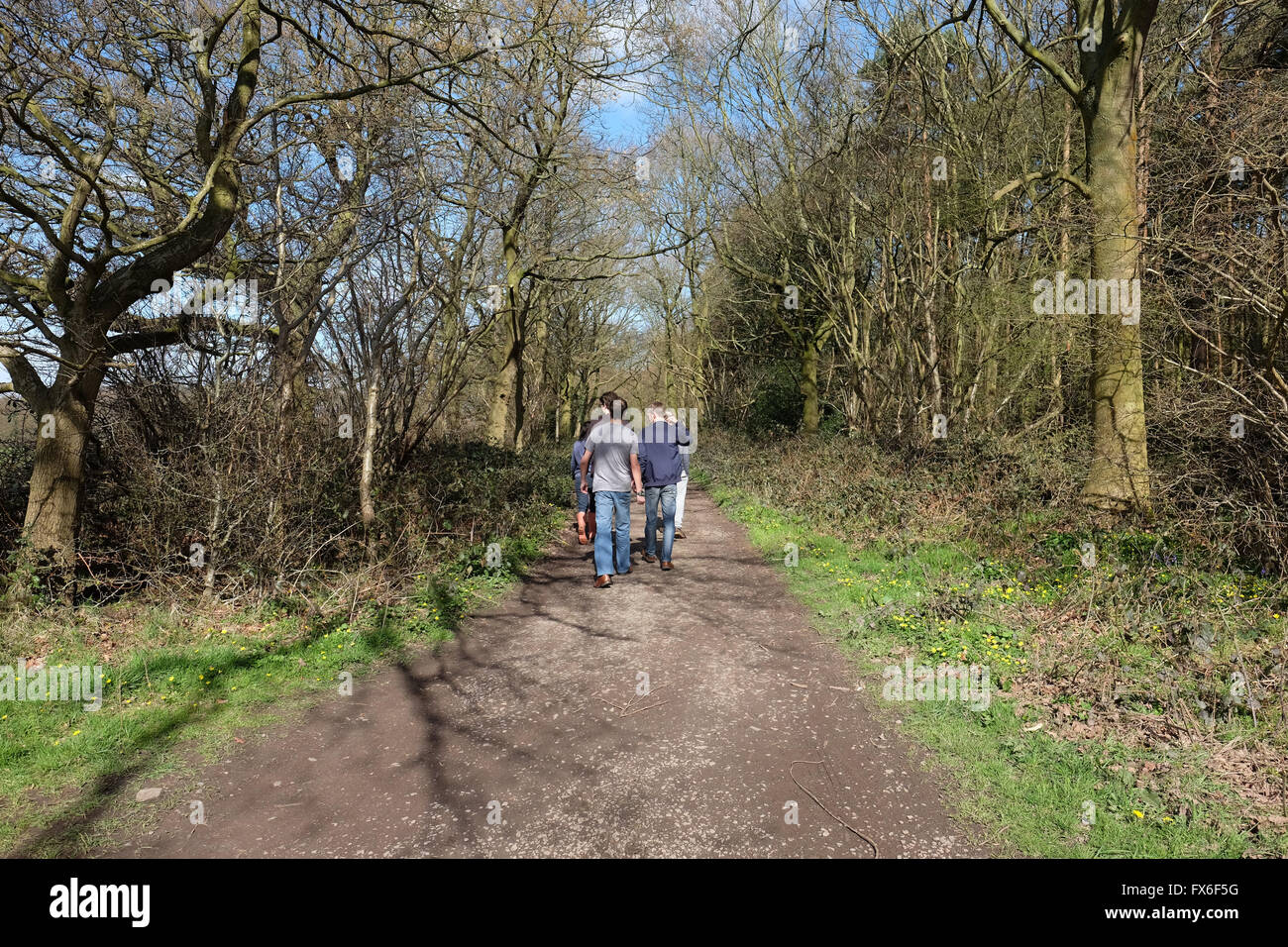 people walking along a country path Stock Photo - Alamy