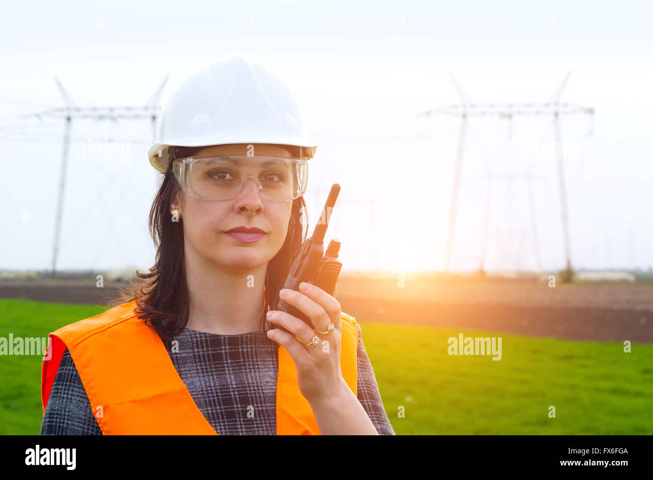 Electrification engineer talk a walkie-talkie Stock Photo - Alamy