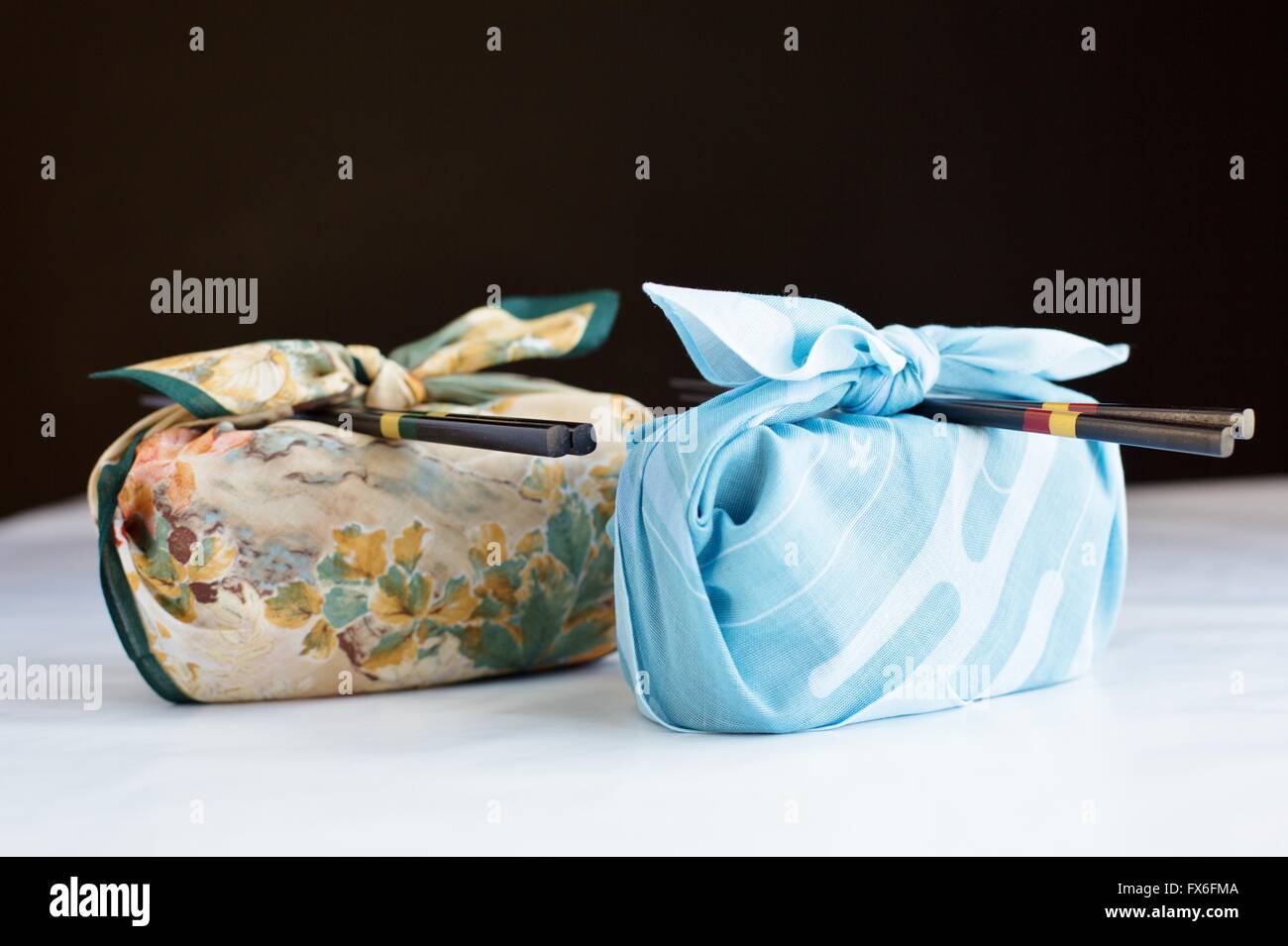 Beautifully wrapped bento boxes with chopsticks Stock Photo - Alamy