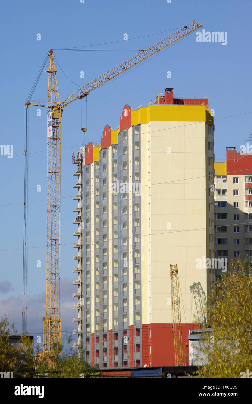 Russia. Construction of a residential home. The work of the tower crane ...