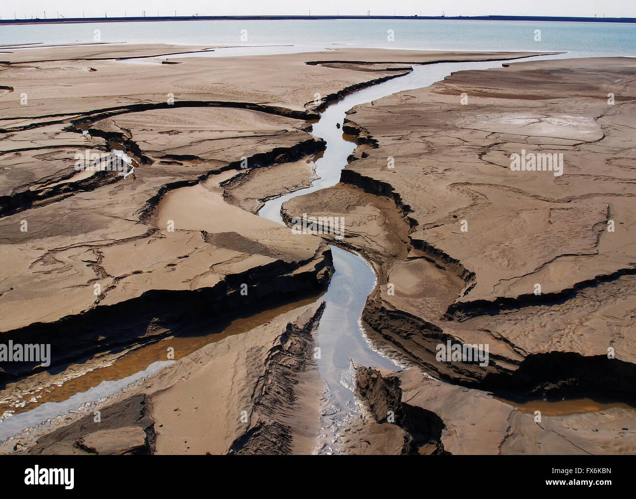 Eroded land with canals at industrial waste area and industrial water ...