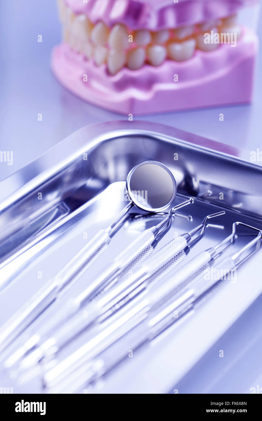 Professional dental tools in a sterile medical light Stock Photo - Alamy