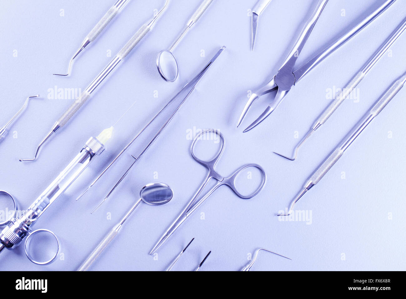 Professional dental tools in a sterile medical light Stock Photo - Alamy