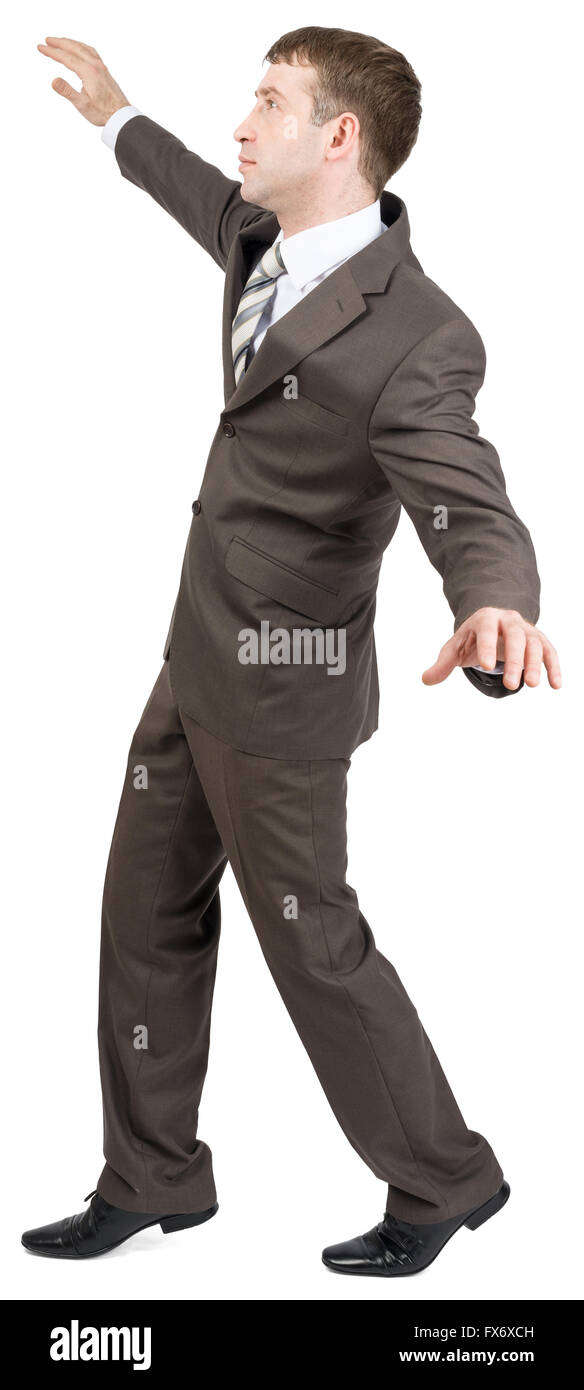 Businessman on tiptoes Stock Photo - Alamy