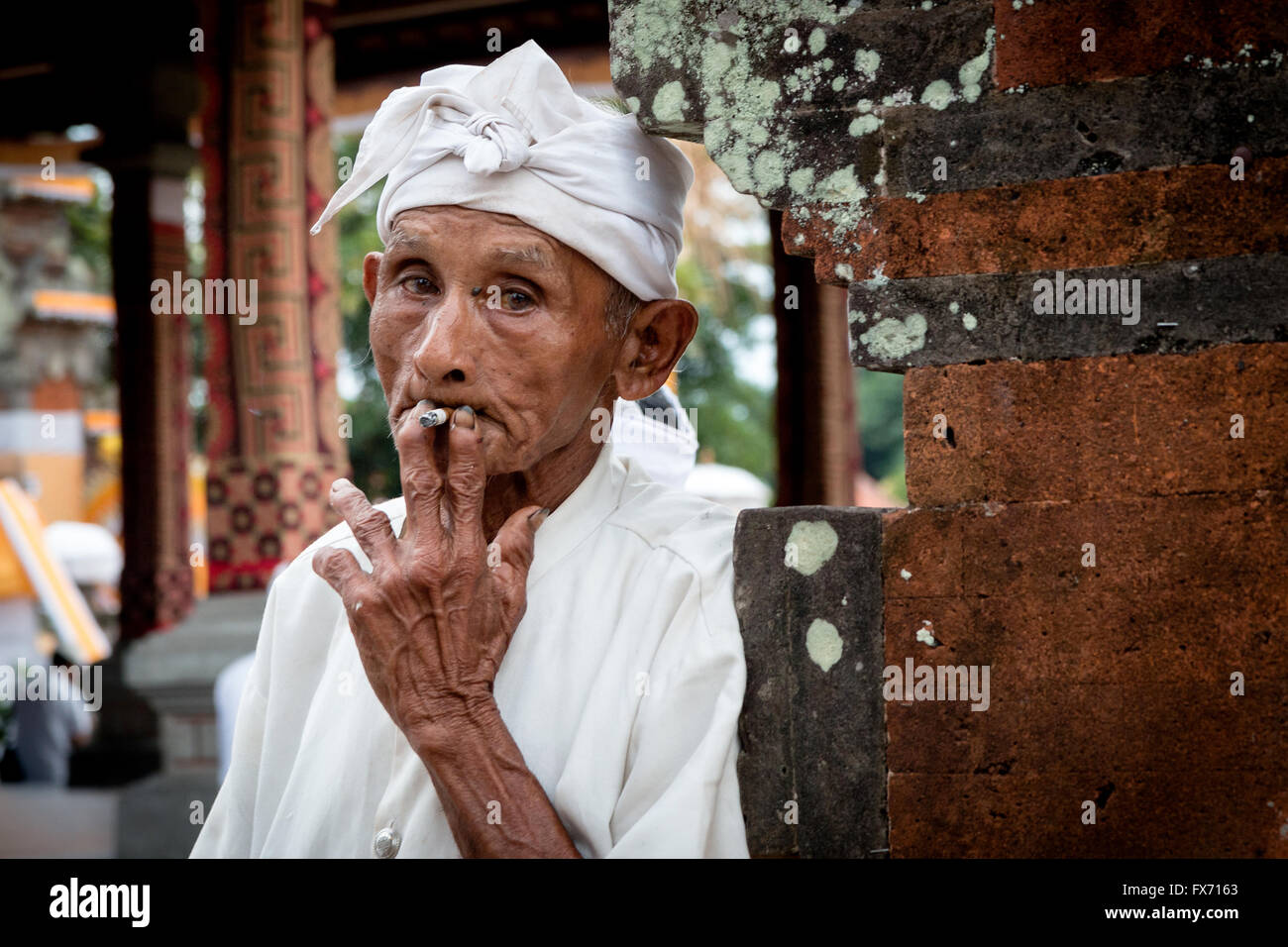 smoking man in Bali Stock Photo - Alamy