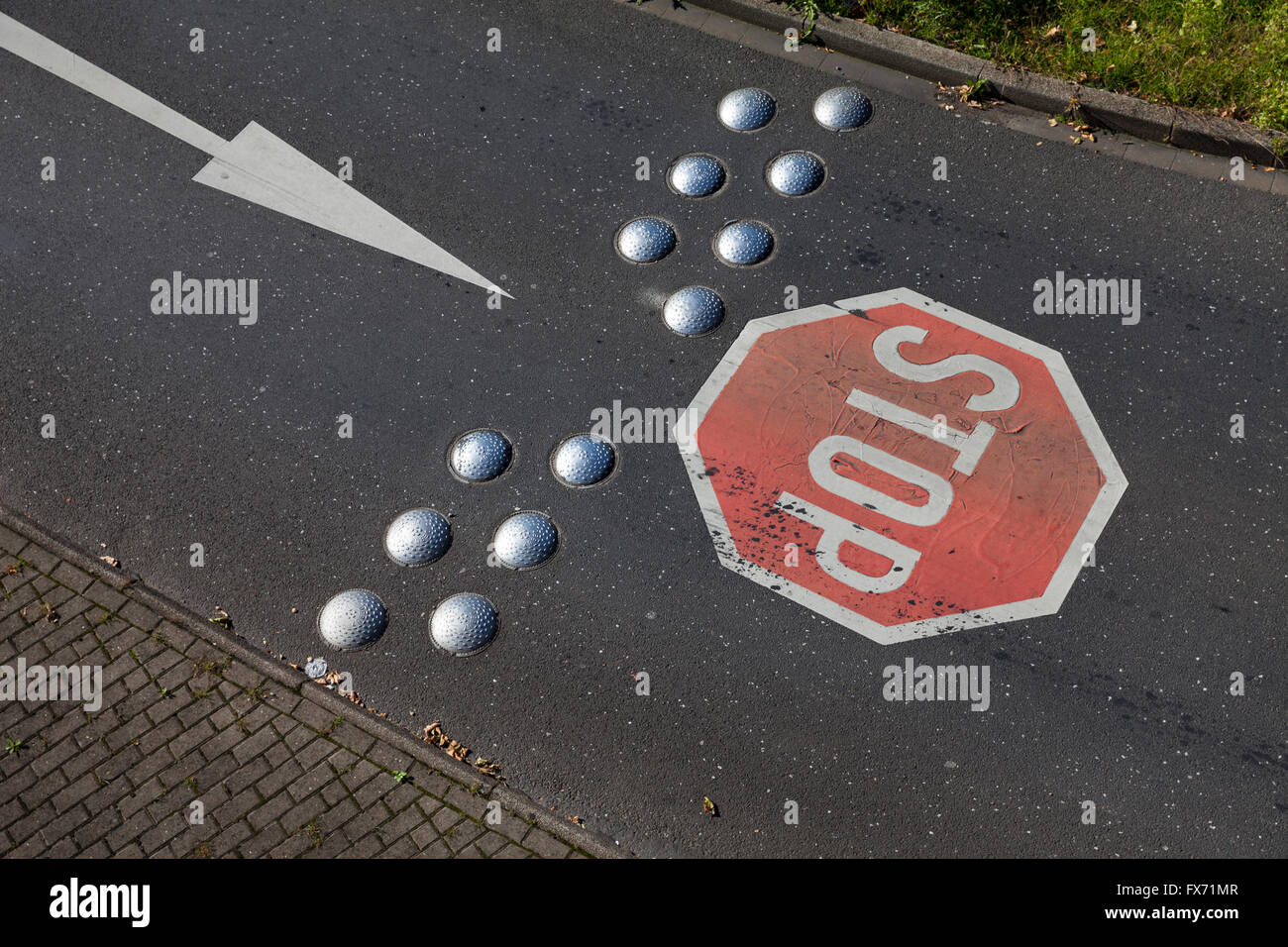 Street with stop sign, directional arrow, Leverkusen, North Rhine ...