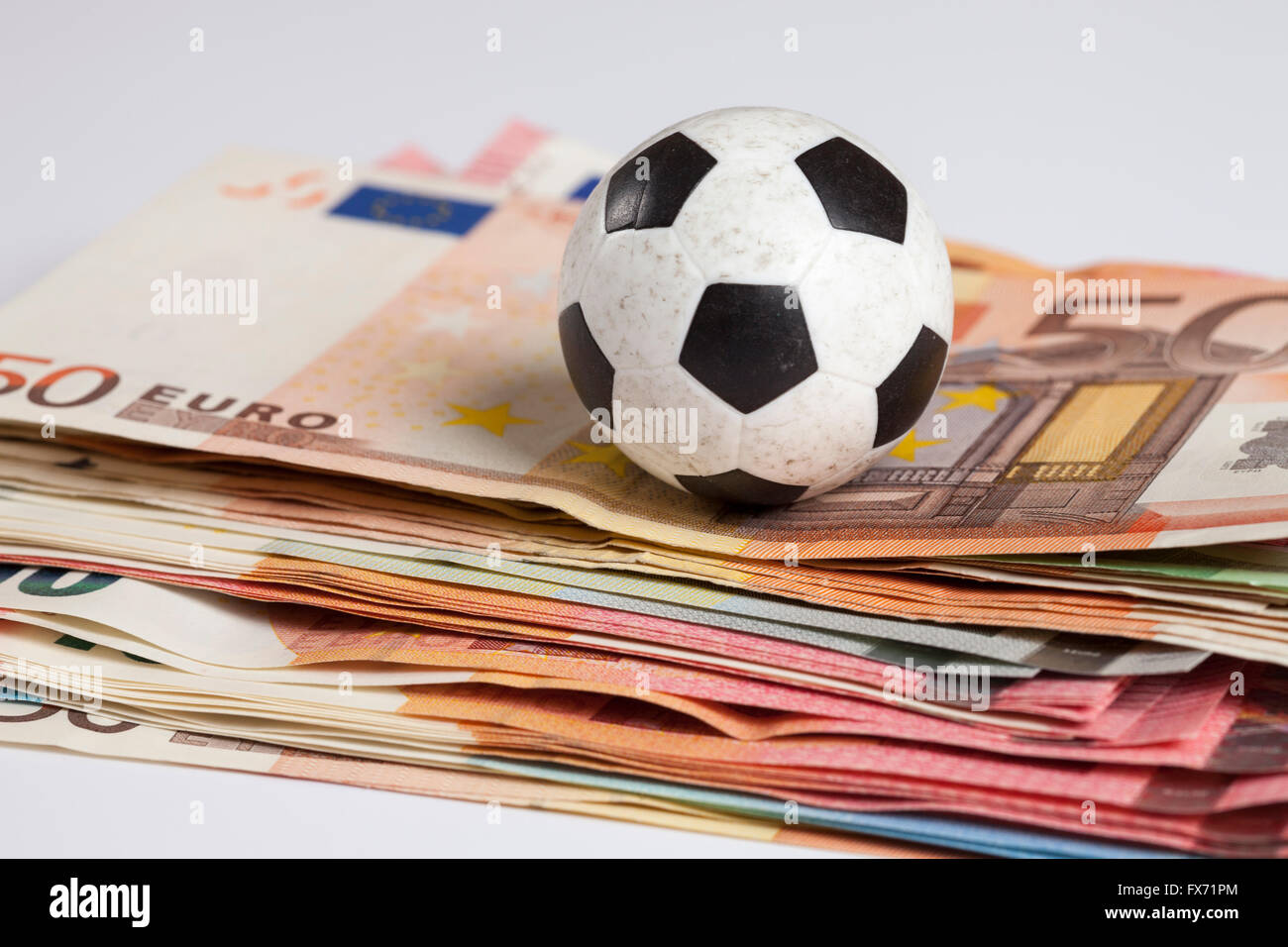 Football money hi-res stock photography and images - Alamy