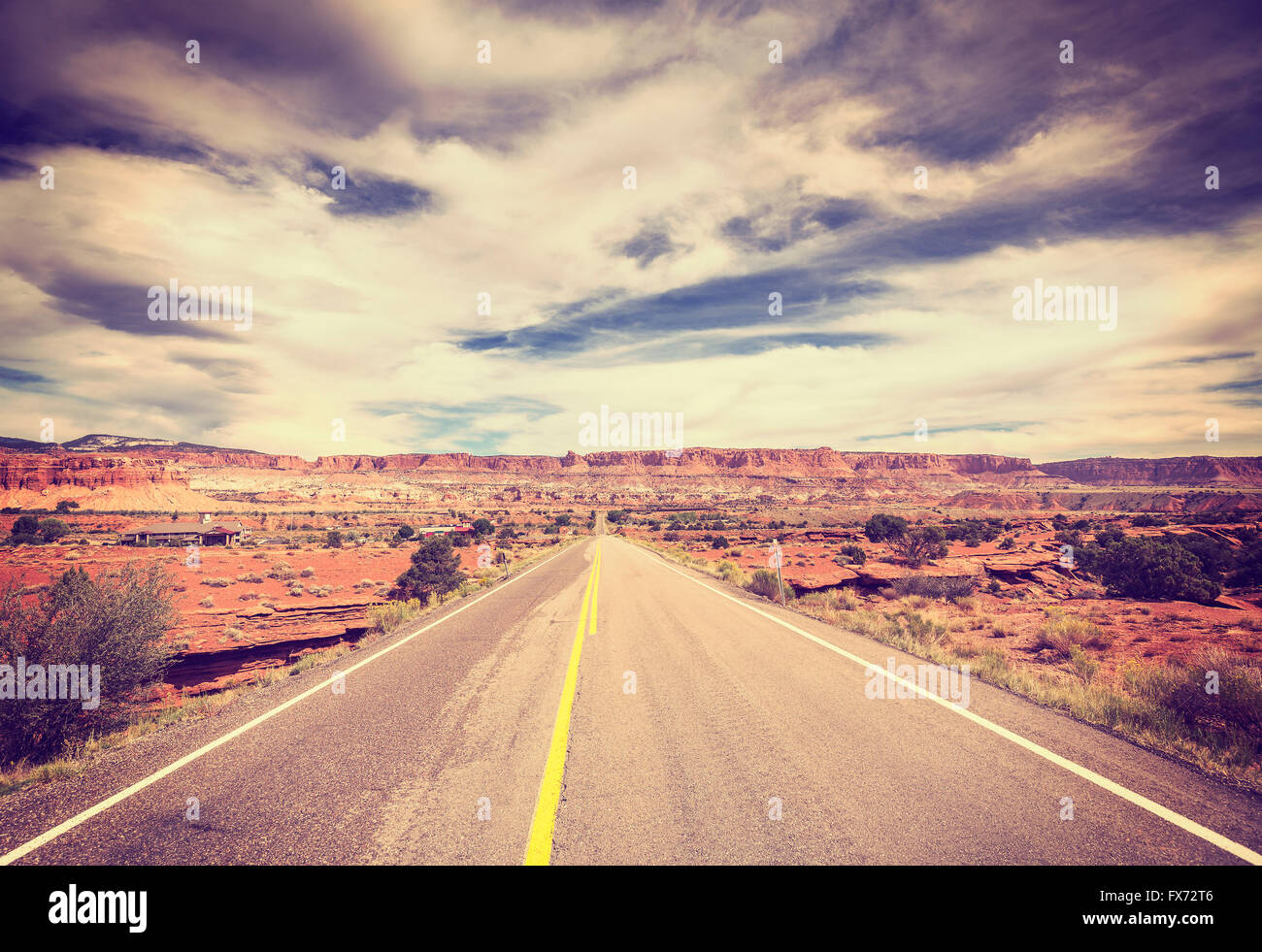 Vintage stylized picture of a scenic desert road, USA Stock Photo - Alamy