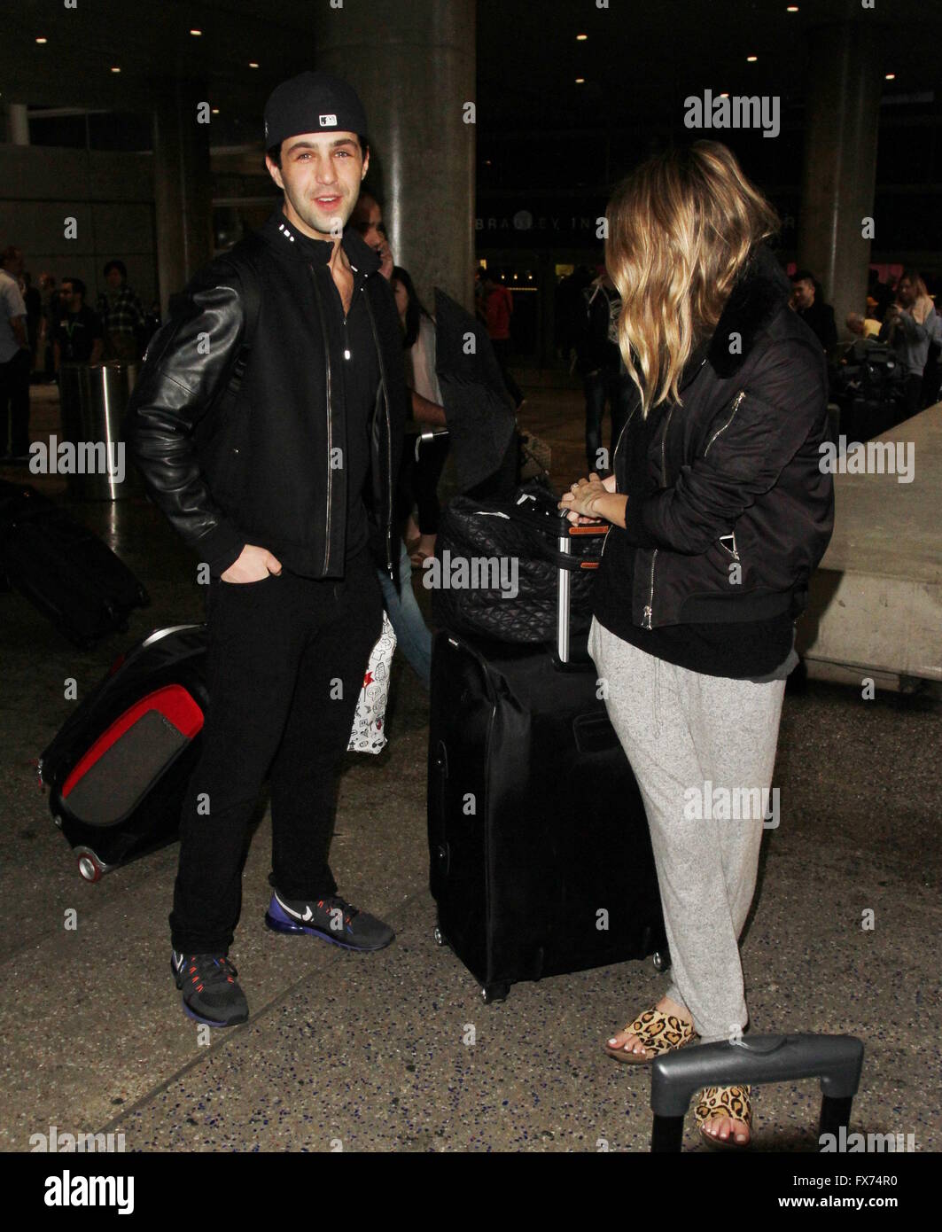 Josh Peck and his girlfriend Paige O'Brien arrive at Los Angeles ...
