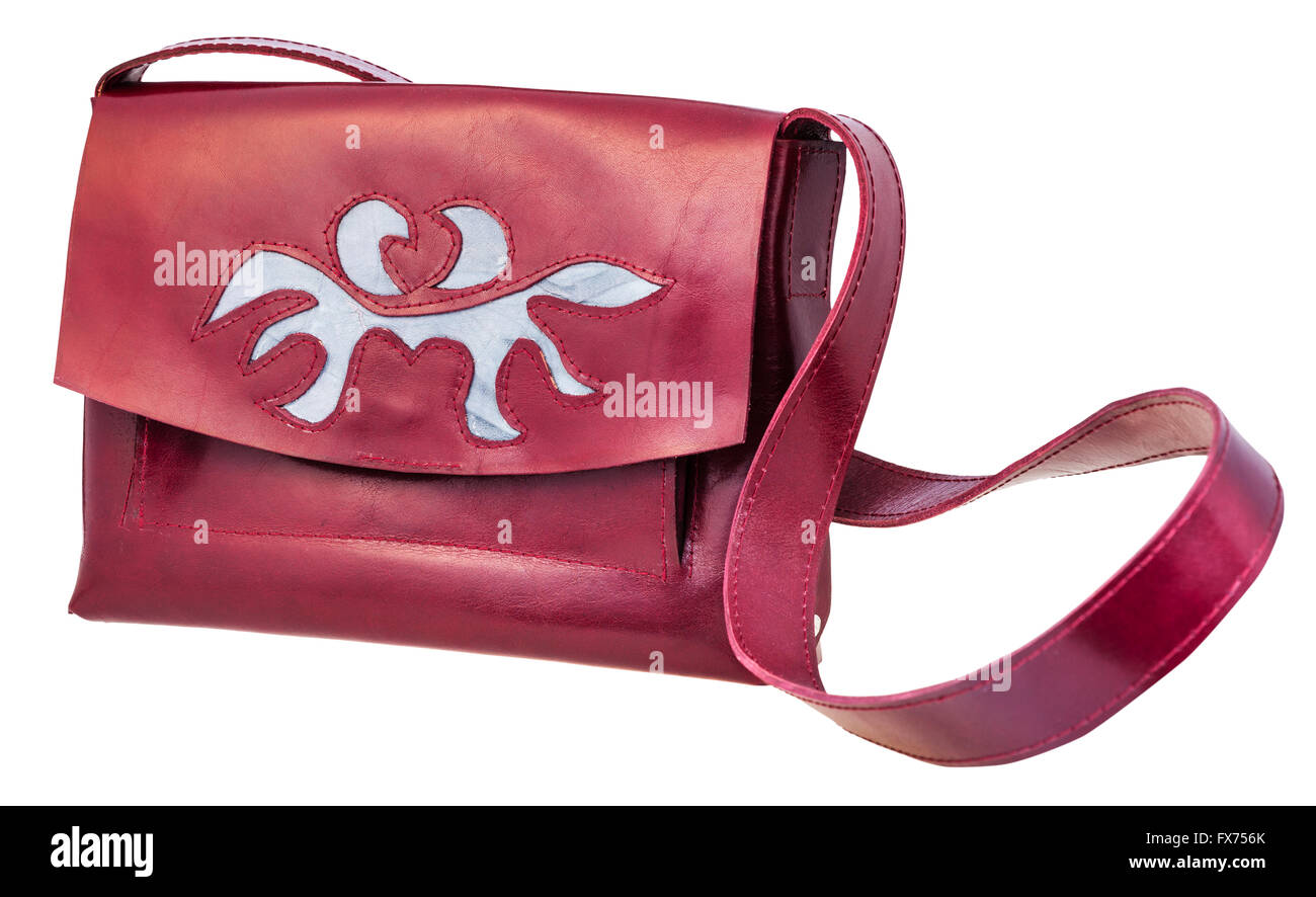 dark cherry color handbag decorated by applique isolated on white ...