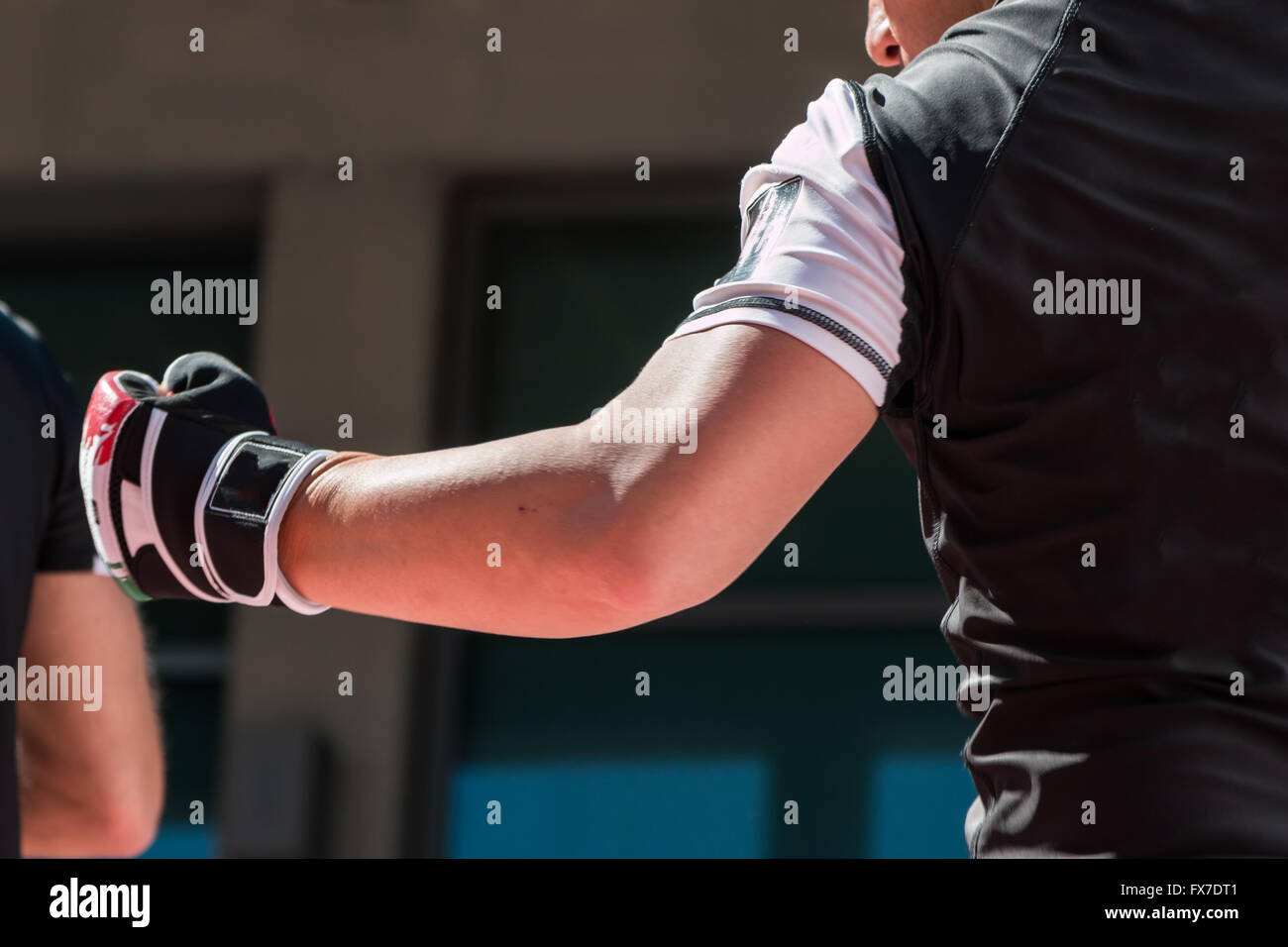 Closeup of Man's Arm with Boxing Glove, Kickboxing Exercise with ...