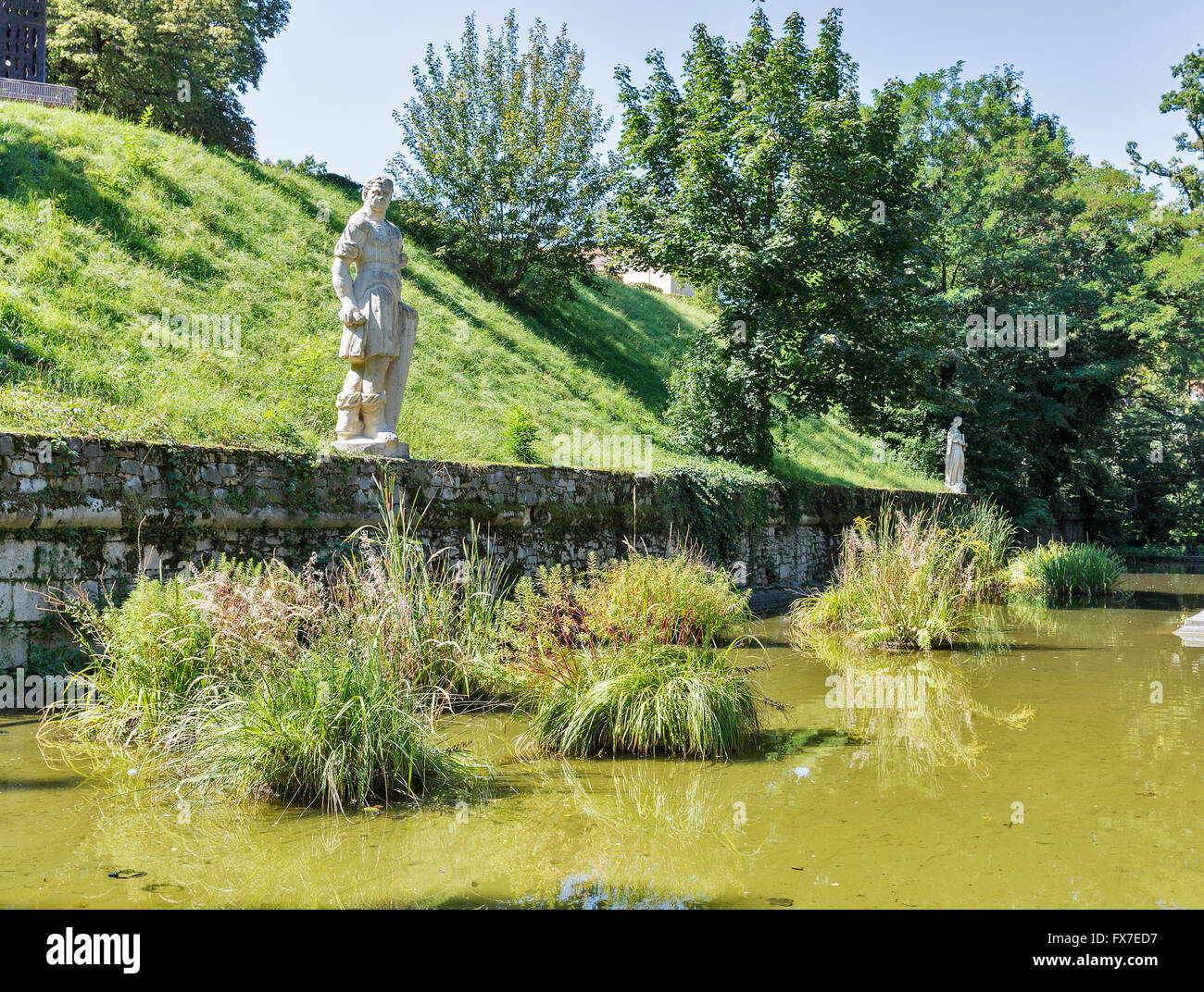 Antique statues along pool in Stadt park in Graz, Austria Stock Photo ...