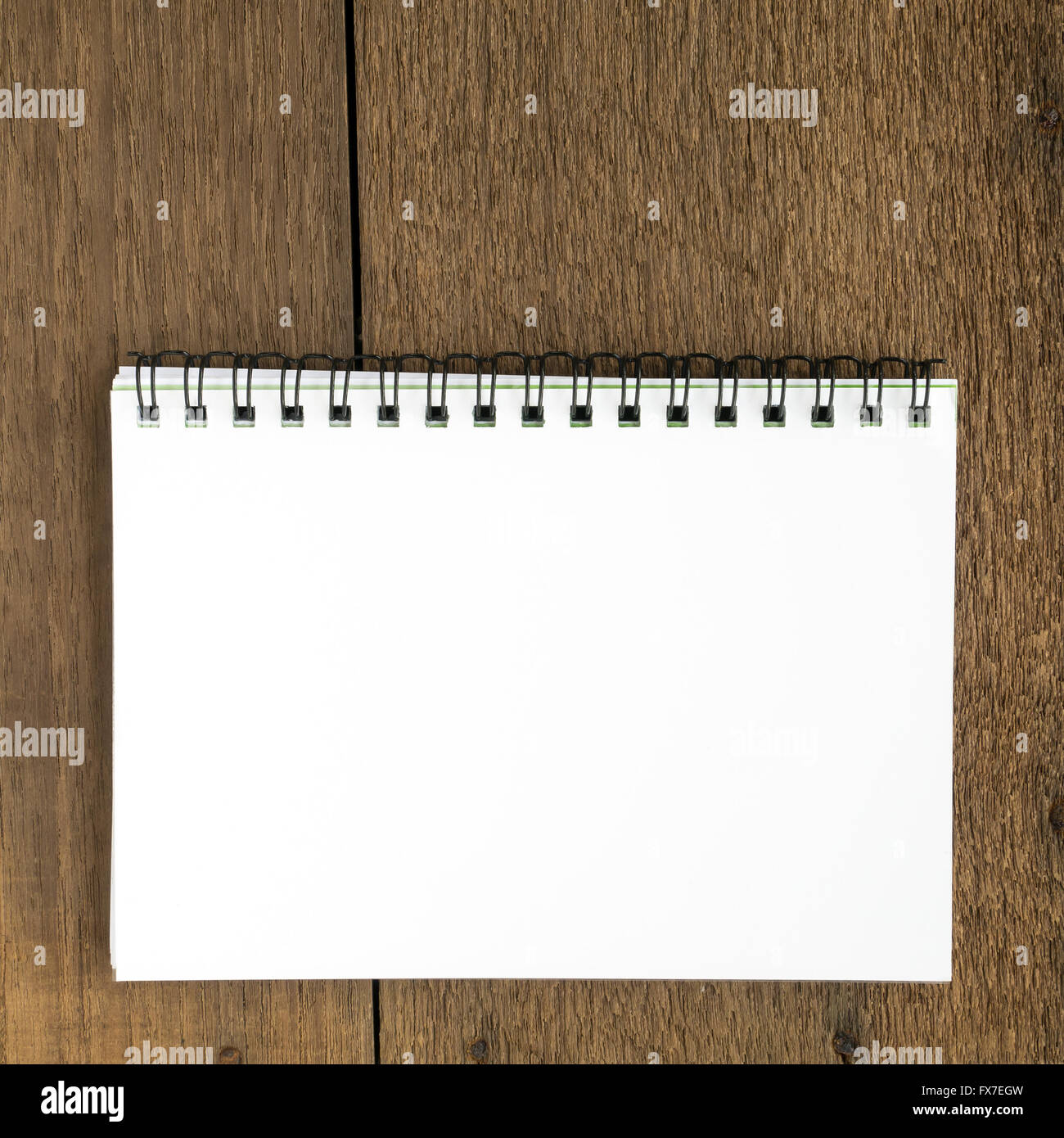 The close up of blank white notebook on wooden plank background Stock ...