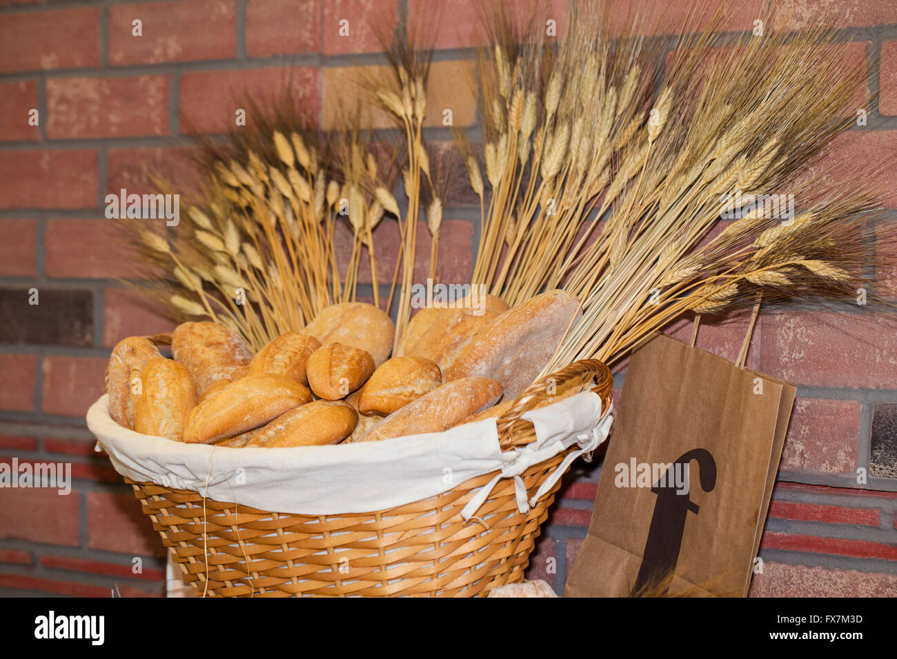 showcase of a basket full of wheat bread Stock Photo - Alamy