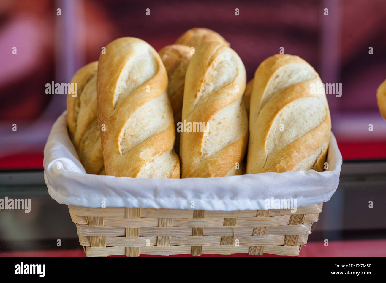basket full of loafs of bread Stock Photo - Alamy