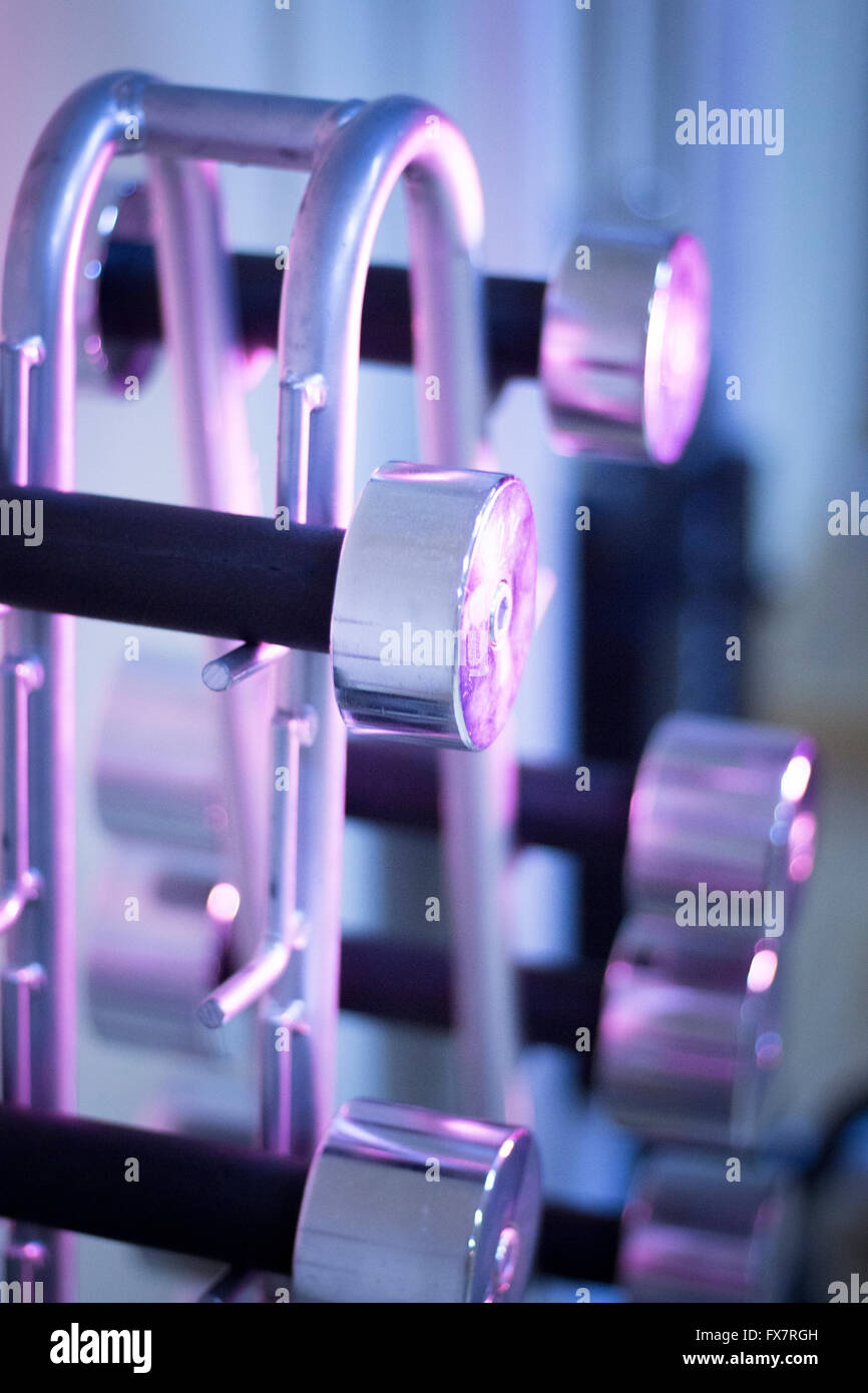 Dumbbell weights on dumbells rack hi-res stock photography and images ...