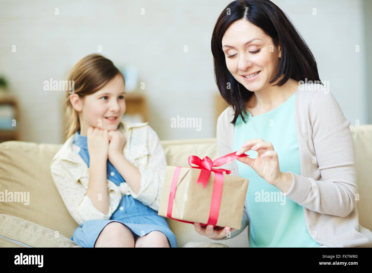 Unpacking Gift High Resolution Stock Photography and Images - Alamy