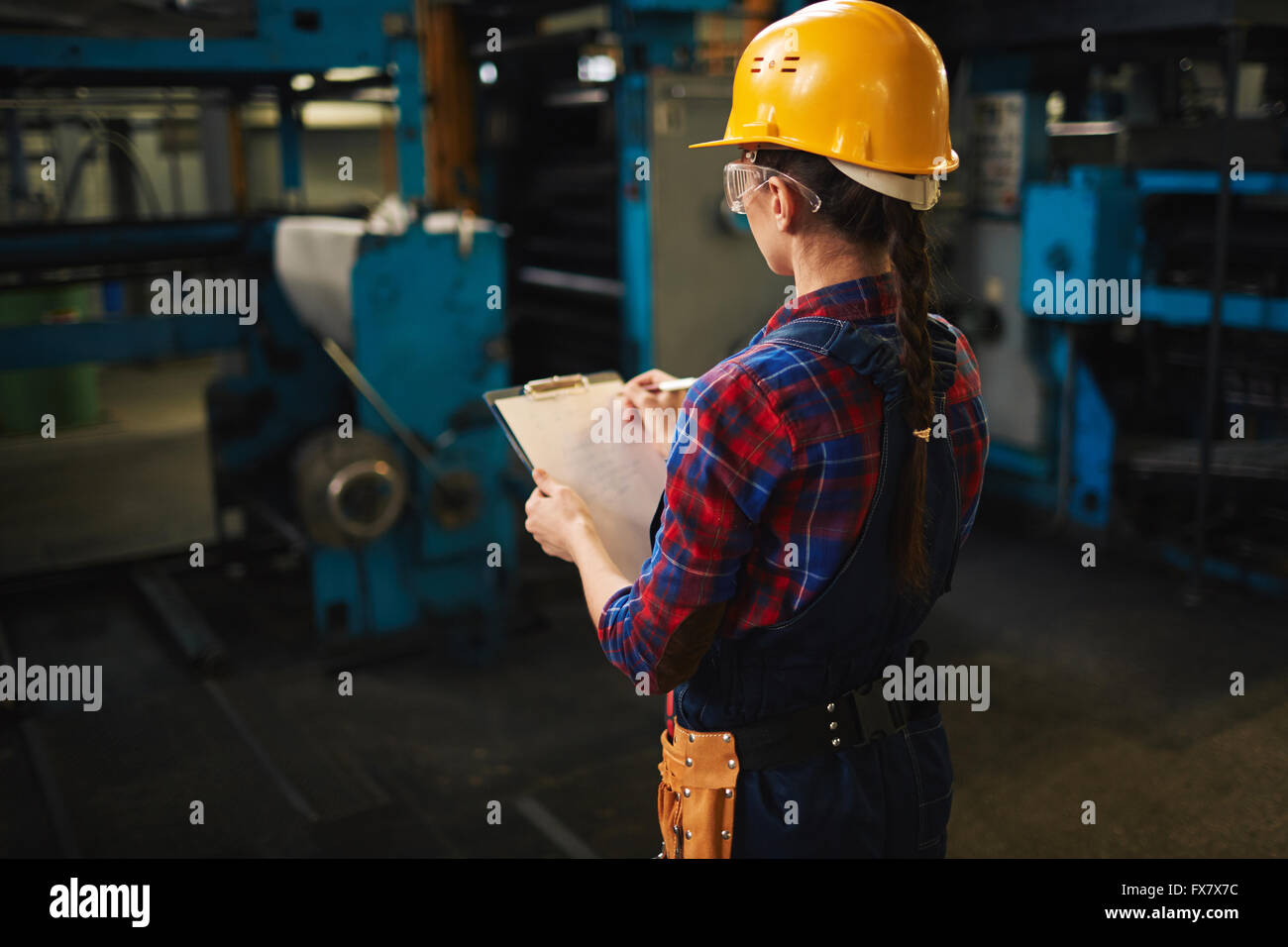Young female engineer writing hi-res stock photography and images - Alamy