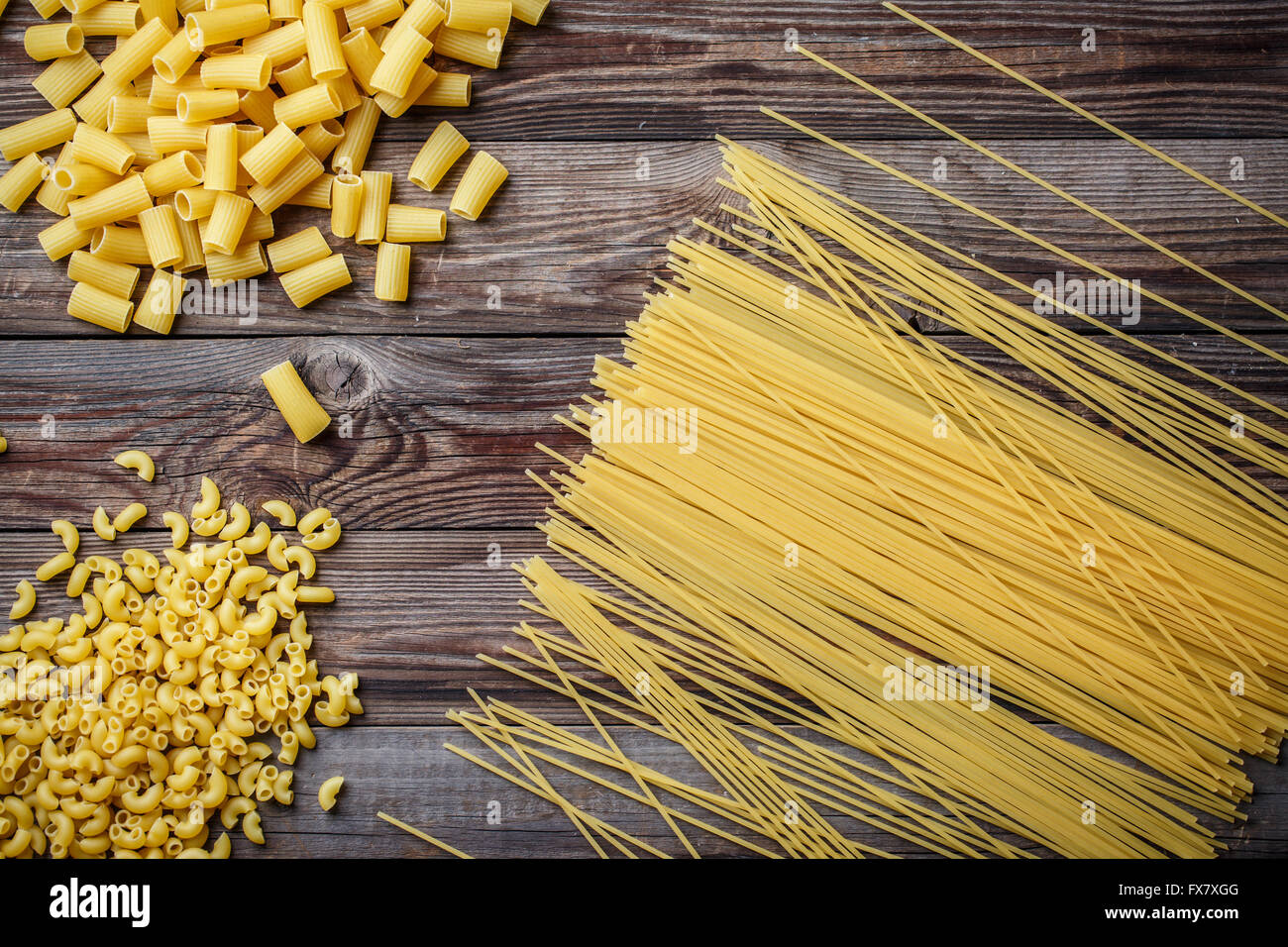 close up portrait of raw homemade italian pasta, macaroni, spaghetti ...