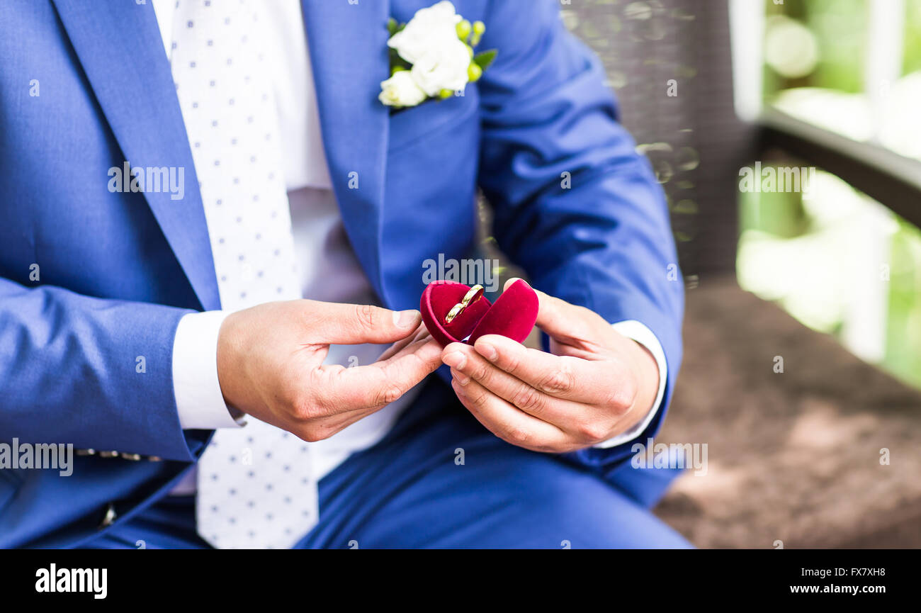 Young mans hand gold hi-res stock photography and images - Alamy