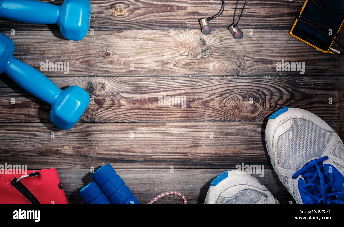 Sport stuff on wooden table, top view Stock Photo - Alamy