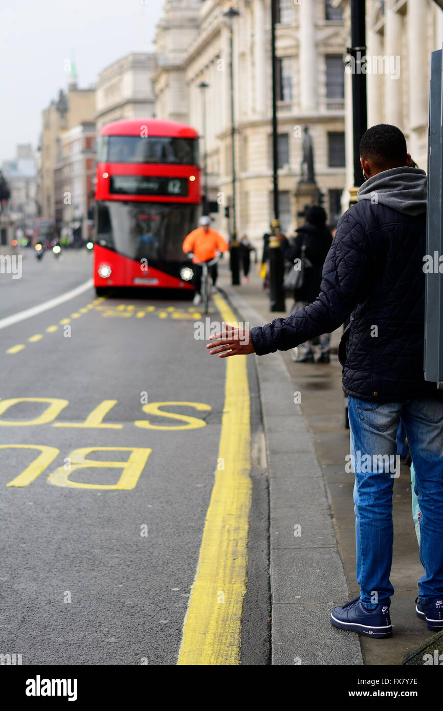 Man at a bus stop hi-res stock photography and images - Alamy
