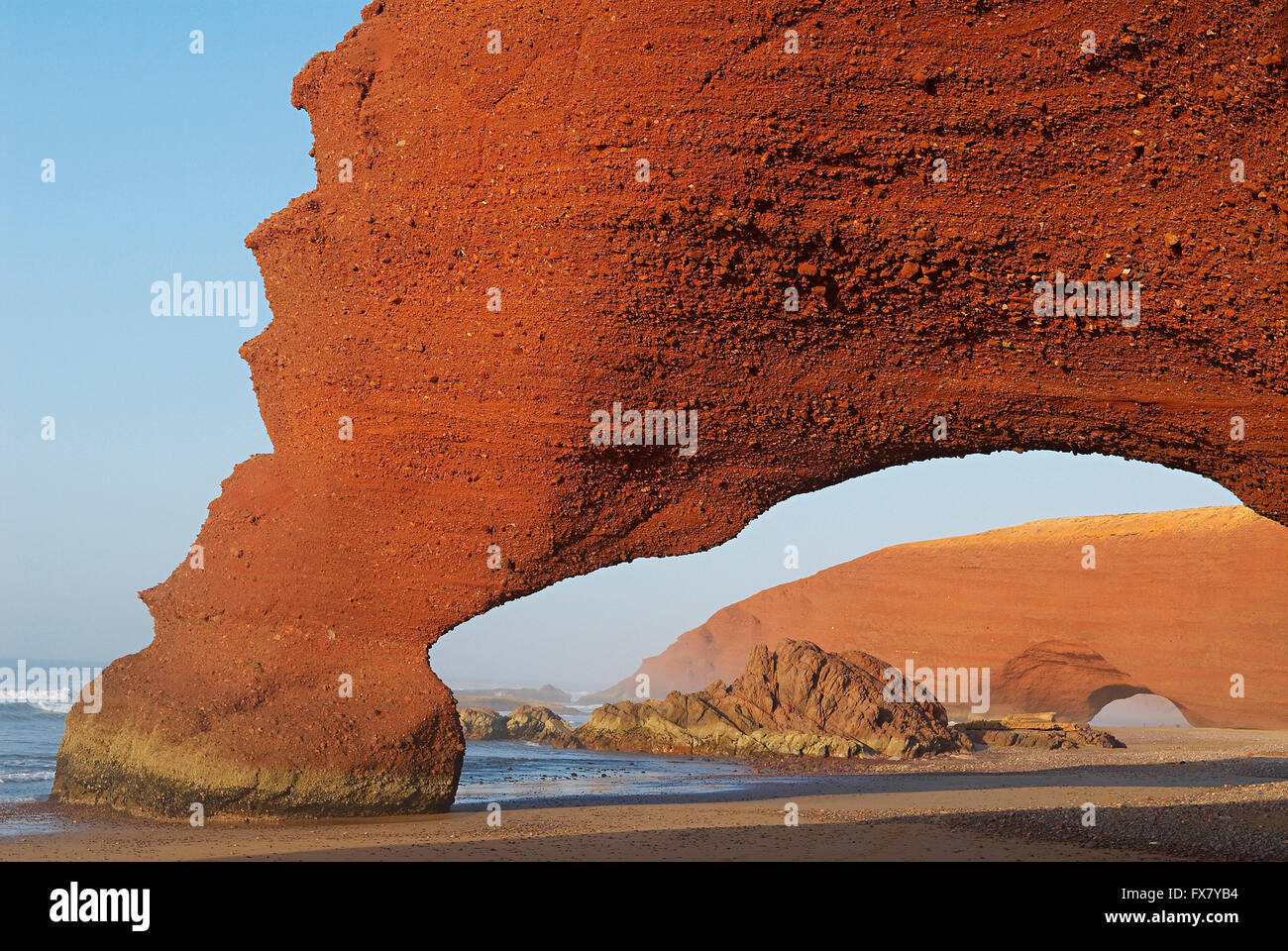 Morocco, Beach, red cliff, Legzira, Sidi Ifni. Atlantic coast Stock ...