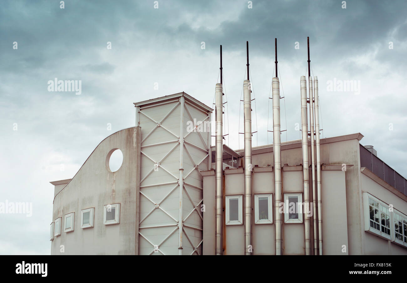 dramatic clouds over modern chemical factory building Stock Photo - Alamy