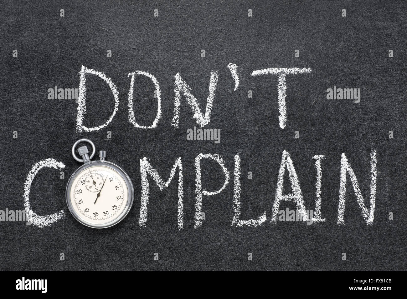 dont complain phrase handwritten on chalkboard with vintage precise ...