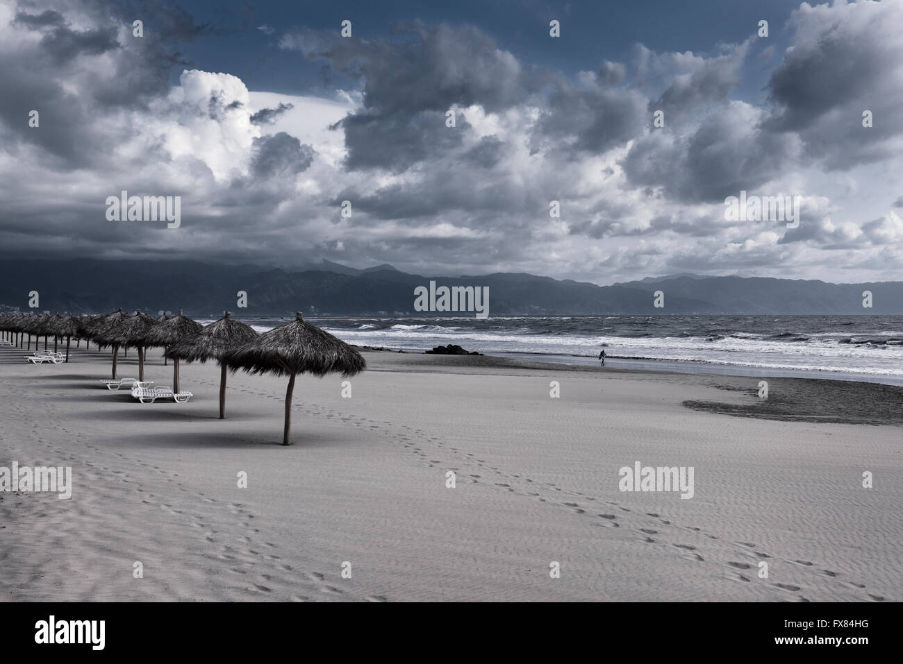 Lonely windswept beach with clouds Pacific Ocean at Nuevo Vallarta ...