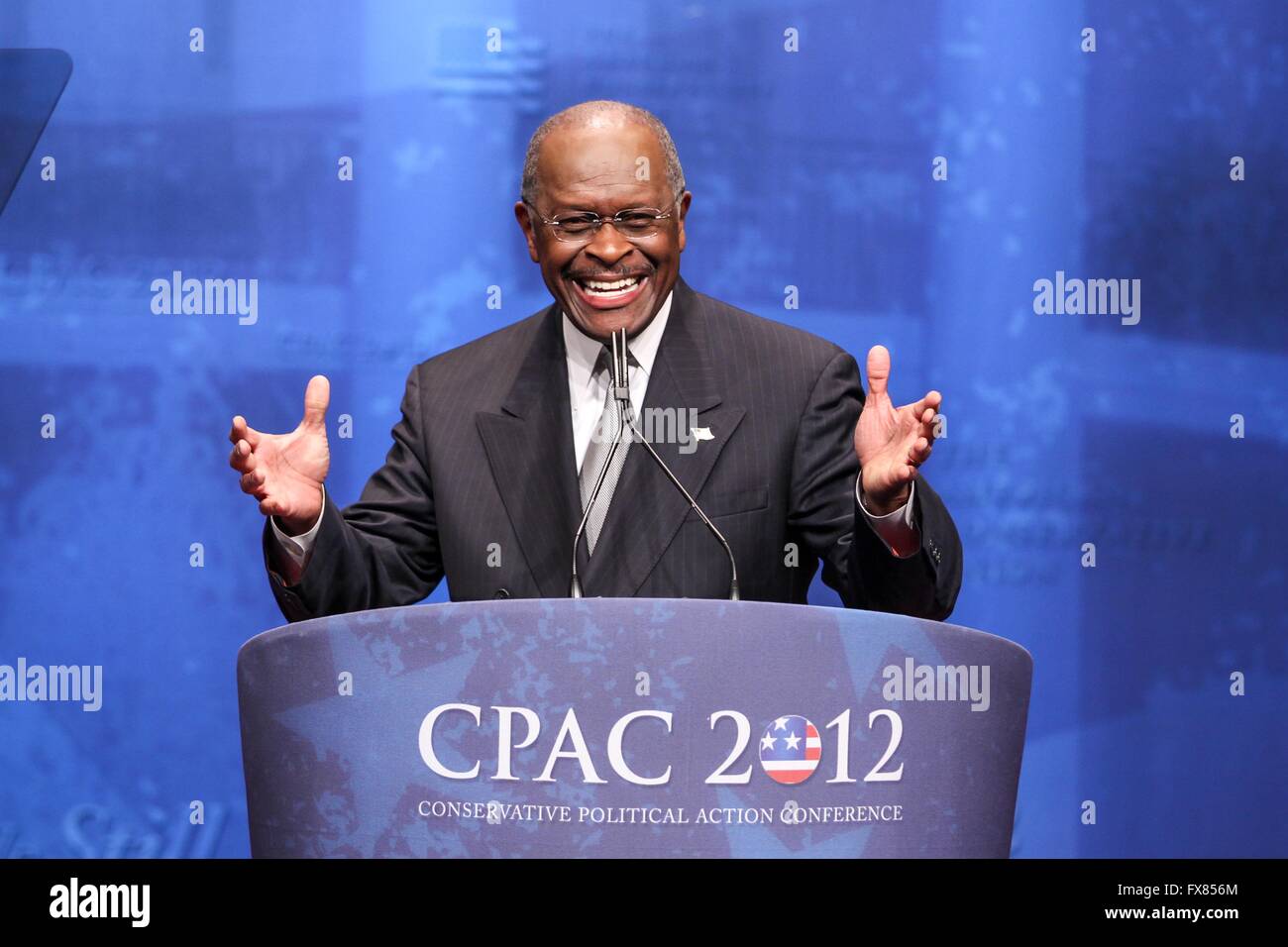 Republican presidential candidate and former CEO Herman Cain addresses ...