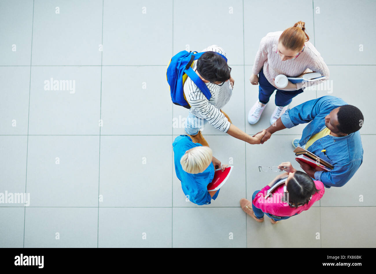Asian woman greeting friends hi-res stock photography and images - Alamy