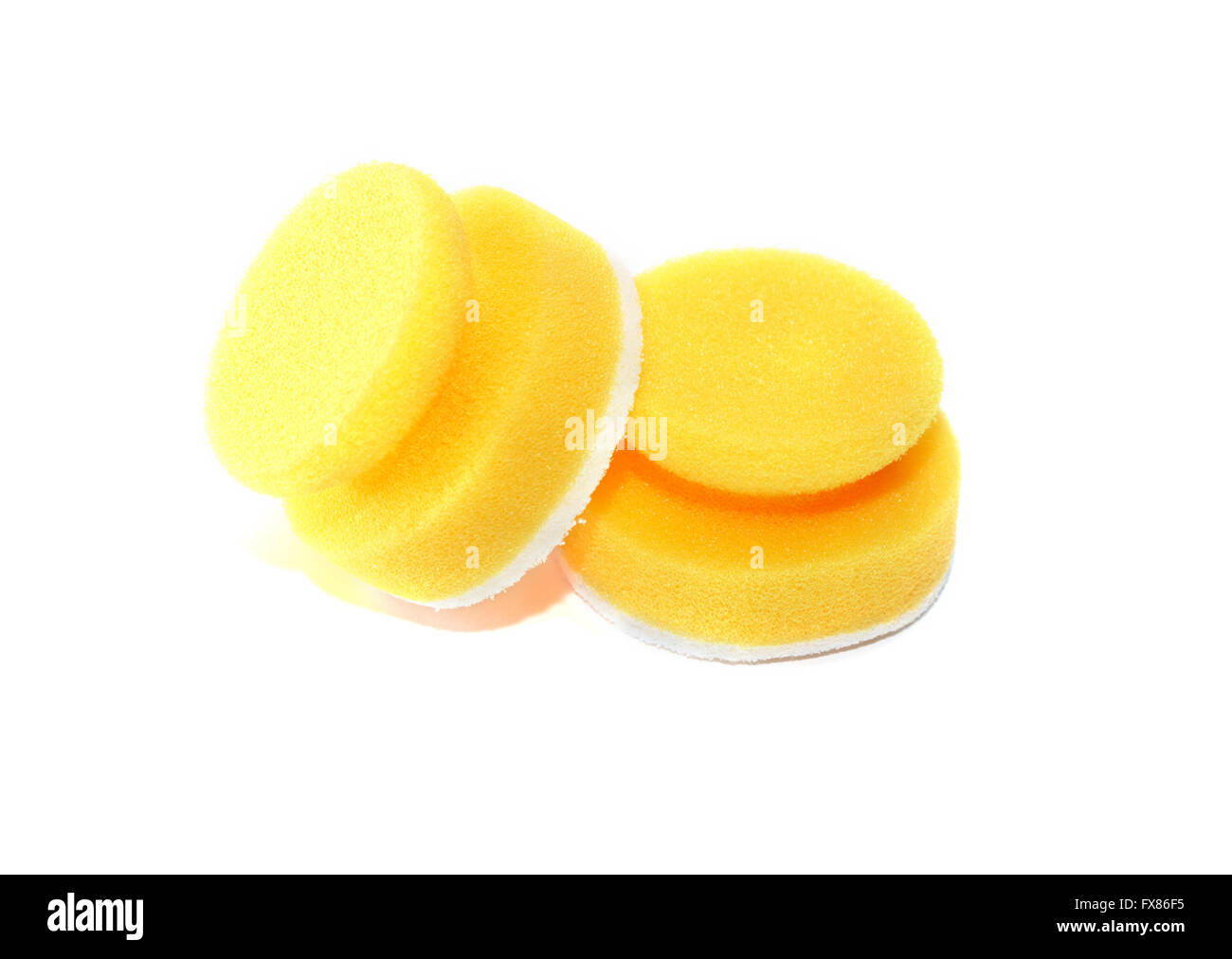 Pair of new yellow kitchen sponges on white background Stock Photo - Alamy