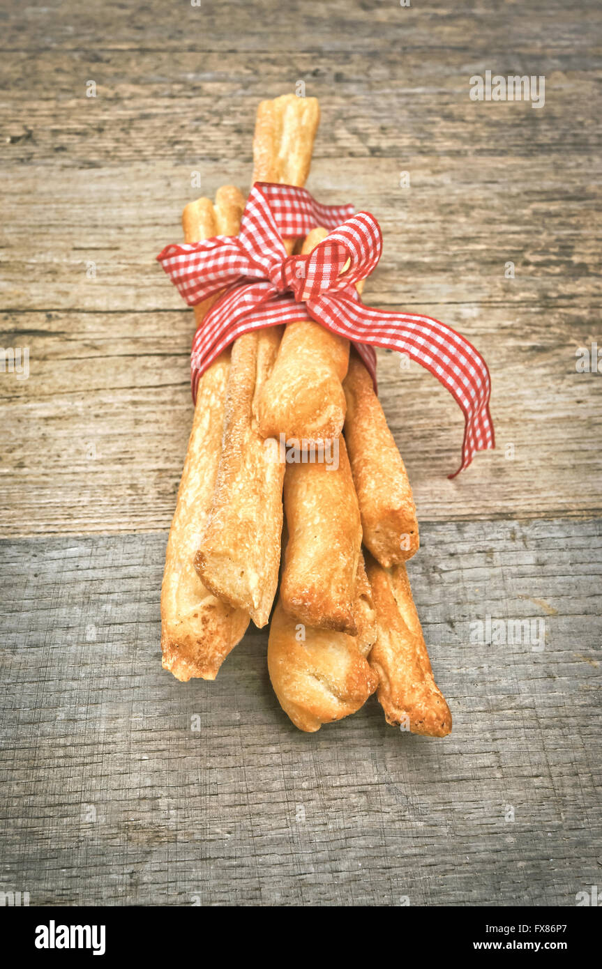 Rustic breadsticks on wood table hi-res stock photography and images ...