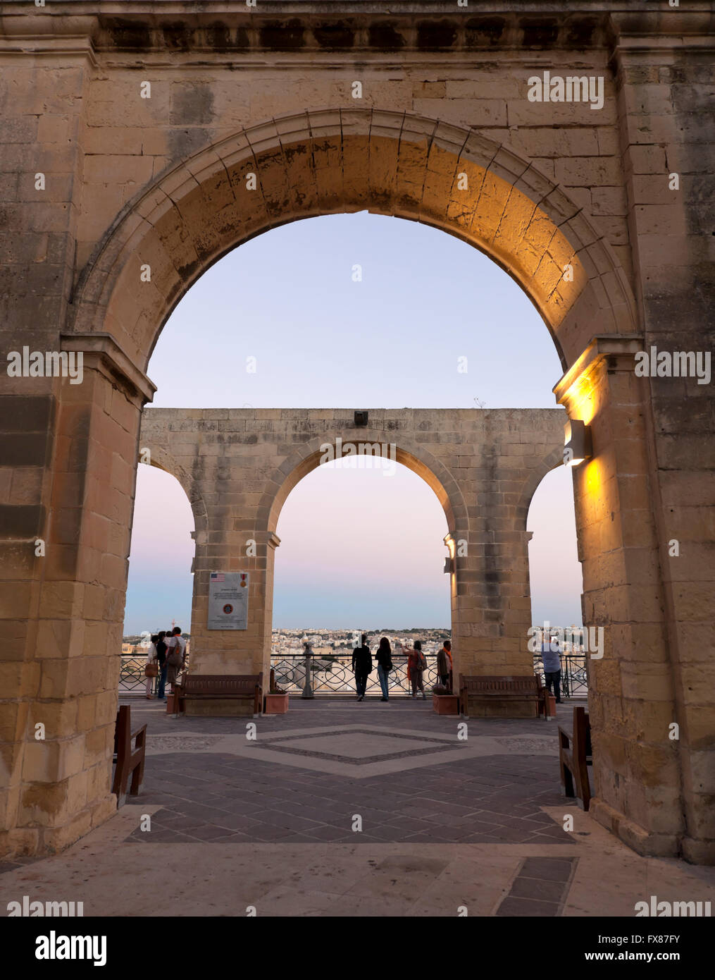 The arcades of Upper Barakka Gardens and the parapet beyond offer ...