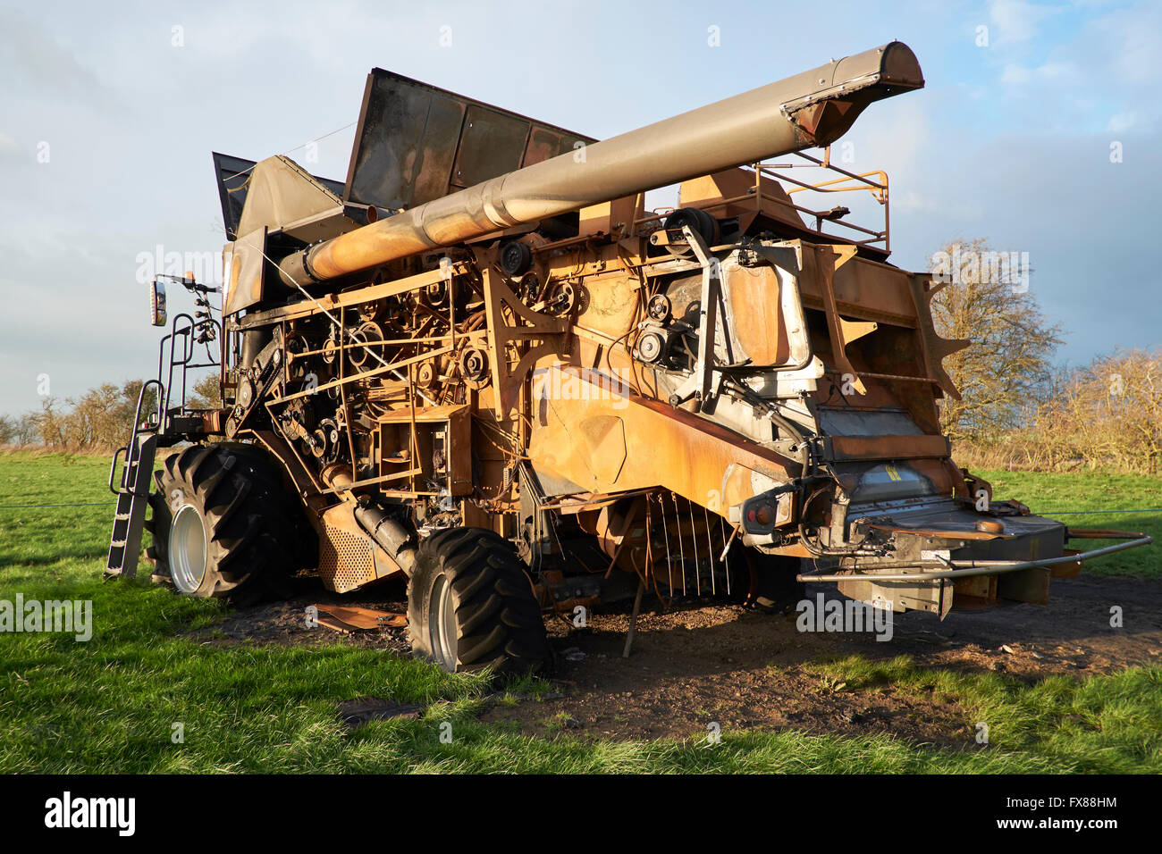 Destroyed Fire Combine Harvester High Resolution Stock Photography and ...