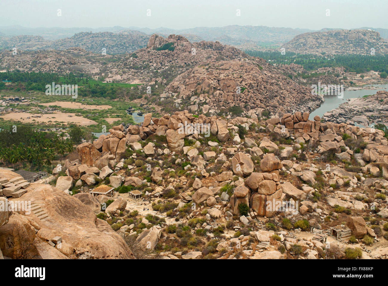 Aerial view of the chain of hills of Hampi from north side of Matanga ...