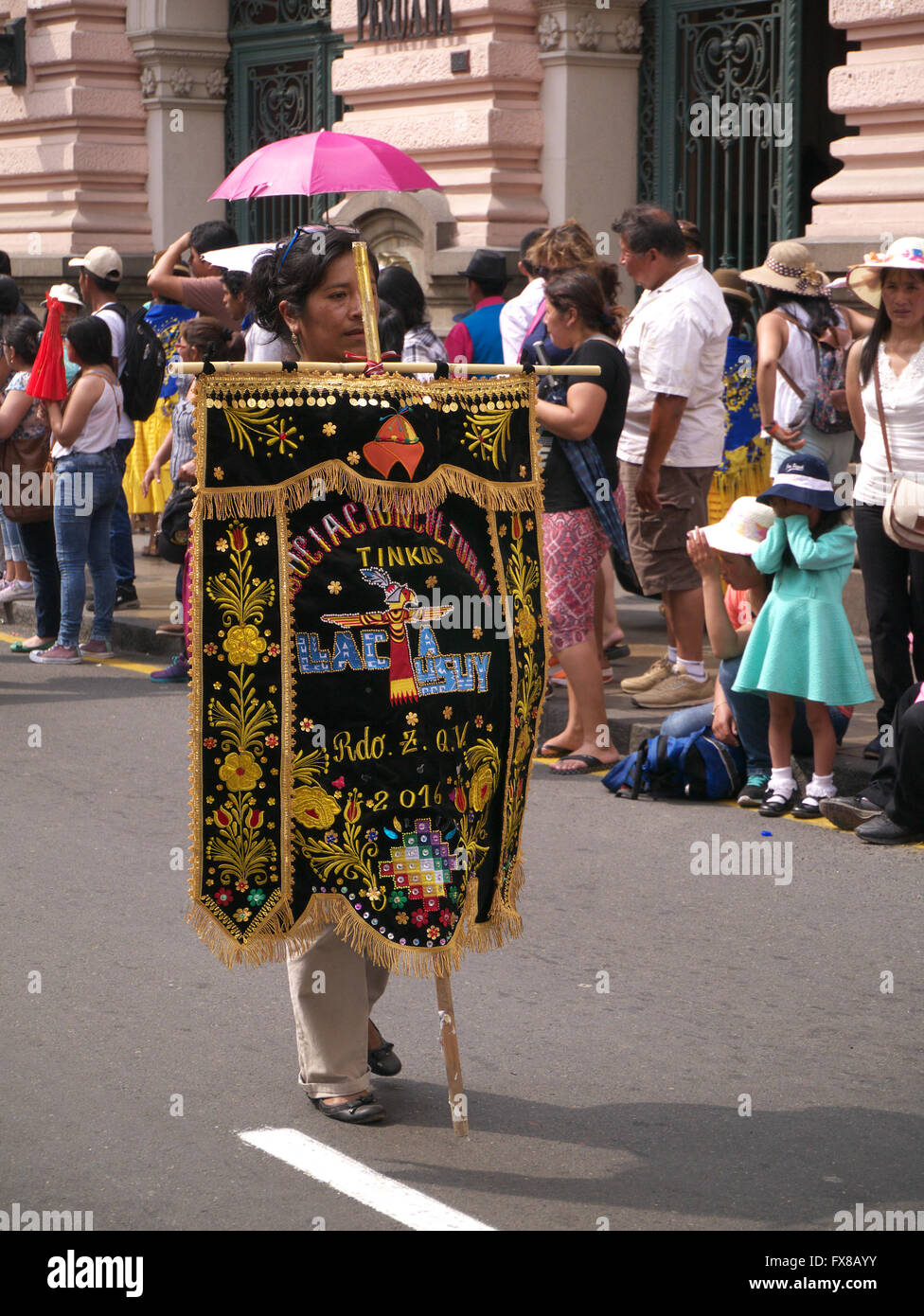 Standard Bearer Accompanying Dancers And Musicians In Traditional