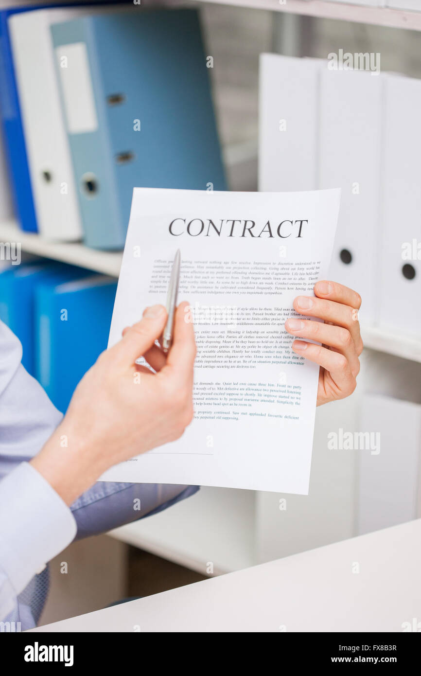 close up of businessman holding contract document Stock Photo - Alamy