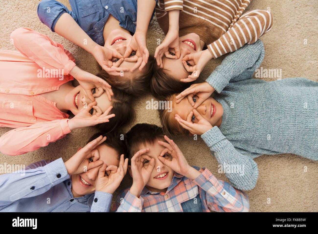 happy children making faces and having fun Stock Photo - Alamy
