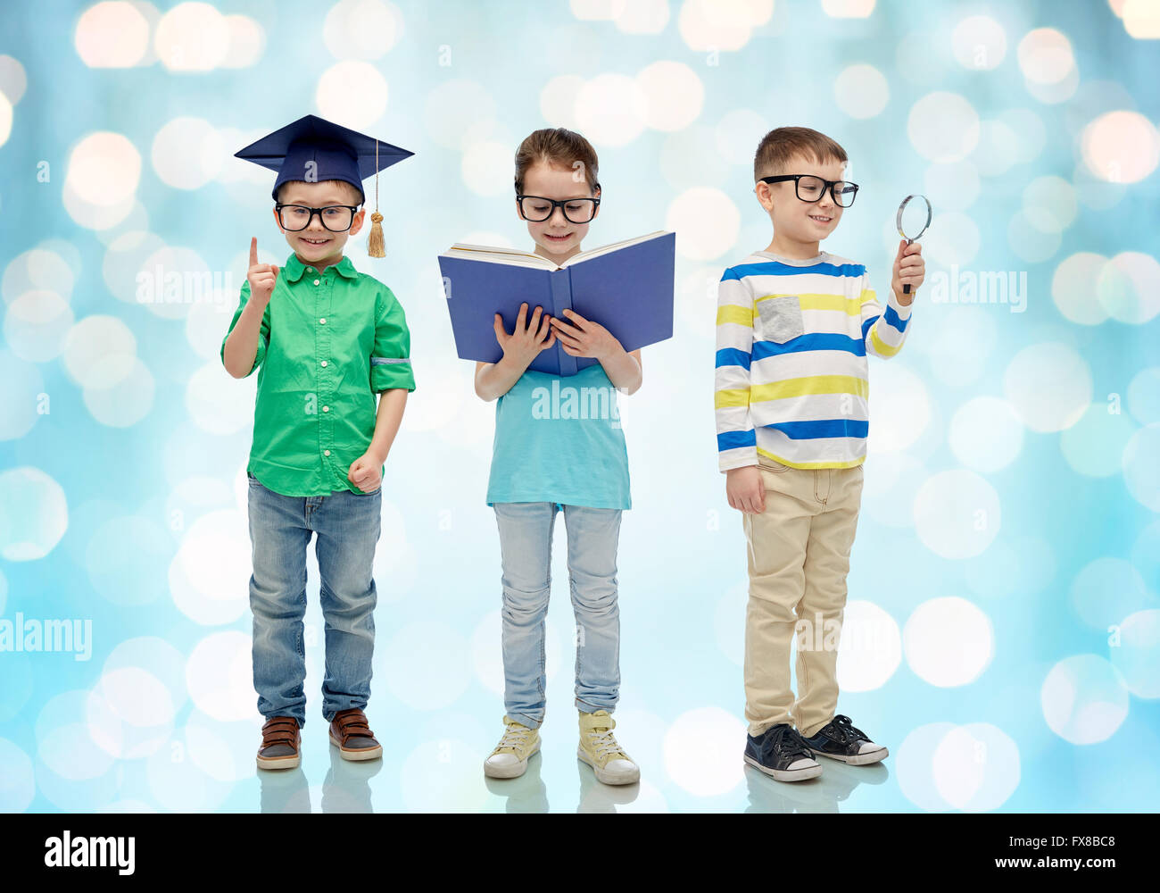 kids in glasses with book, lense and bachelor hat Stock Photo - Alamy