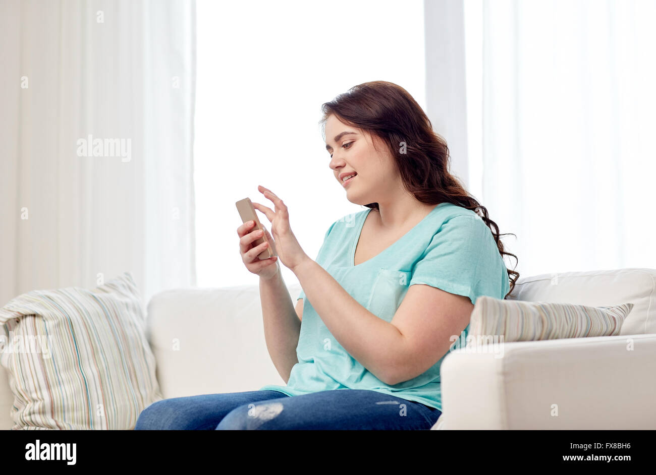 Happy plus size woman hi-res stock photography and images - Alamy