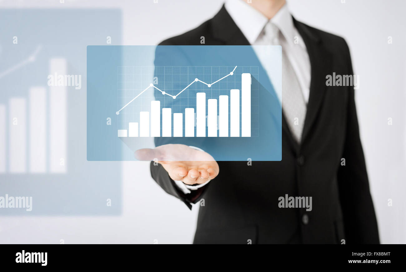 close up of man hand showing diagram chart Stock Photo - Alamy