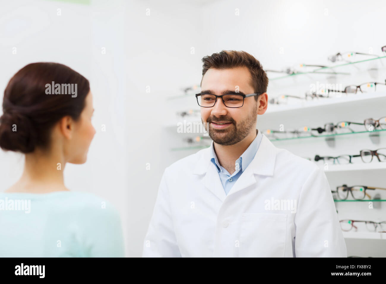 Optical store talking hi-res stock photography and images - Alamy