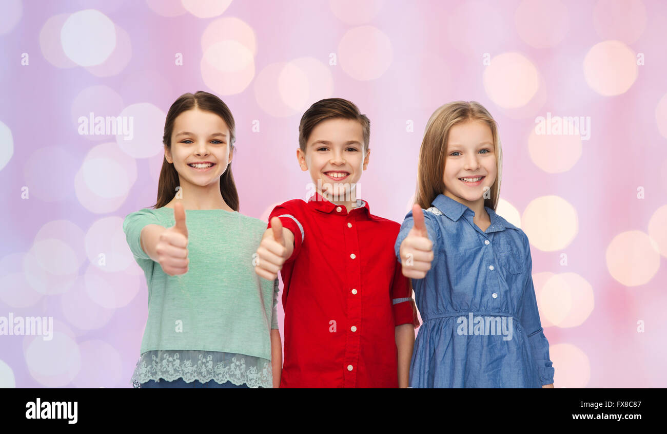 happy children showing thumbs up Stock Photo - Alamy